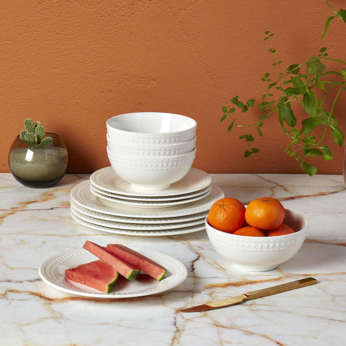 12-Piece Bloom Embossed White Porcelain Dinnerware Set